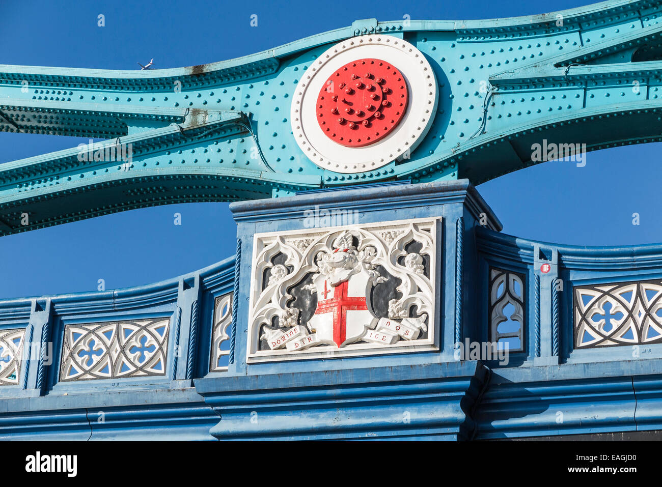 A colourful blue and red detail including crest at Tower Bridge, an ...