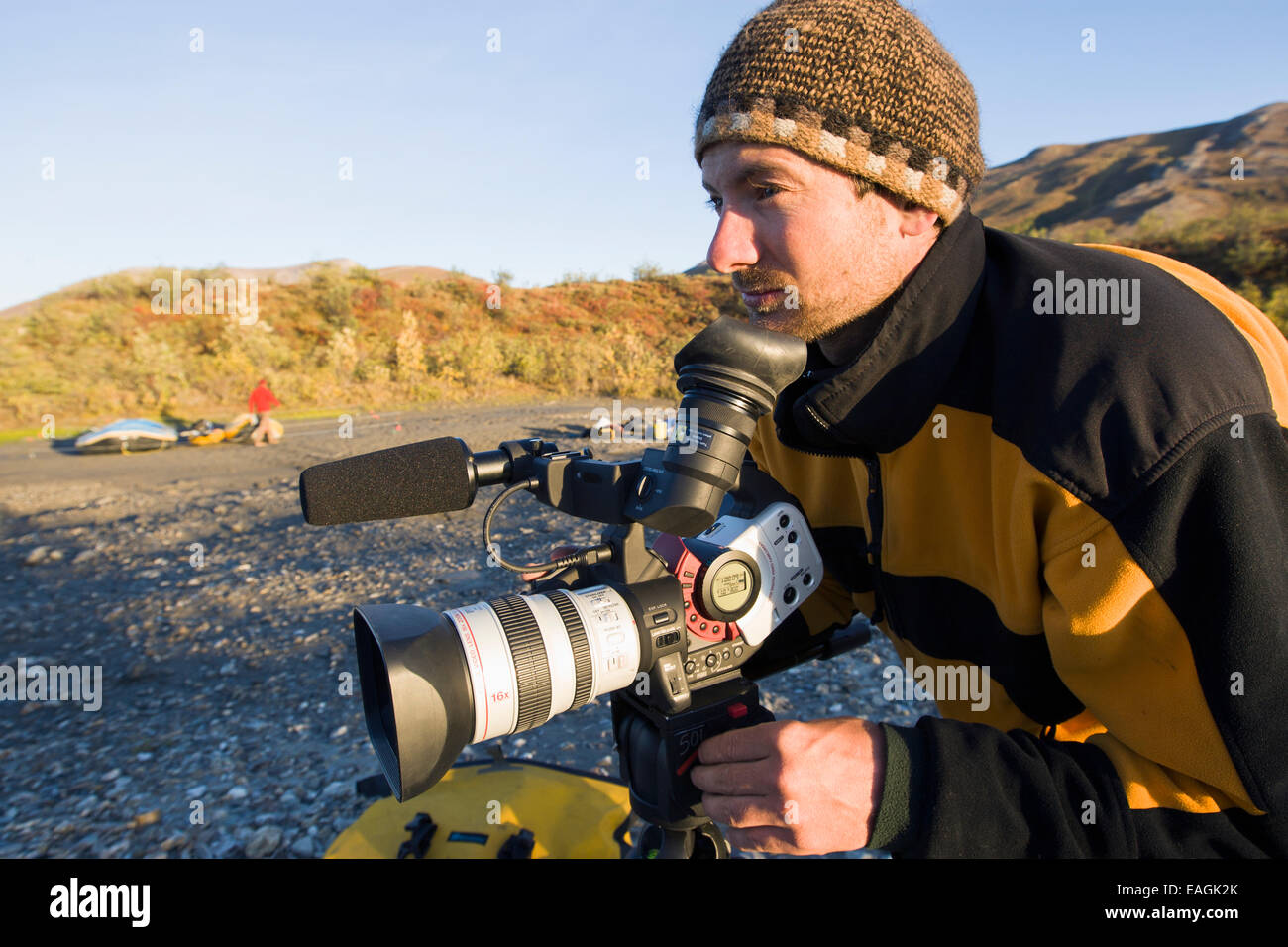 Mature man video camera beach hi-res stock photography and images - Alamy