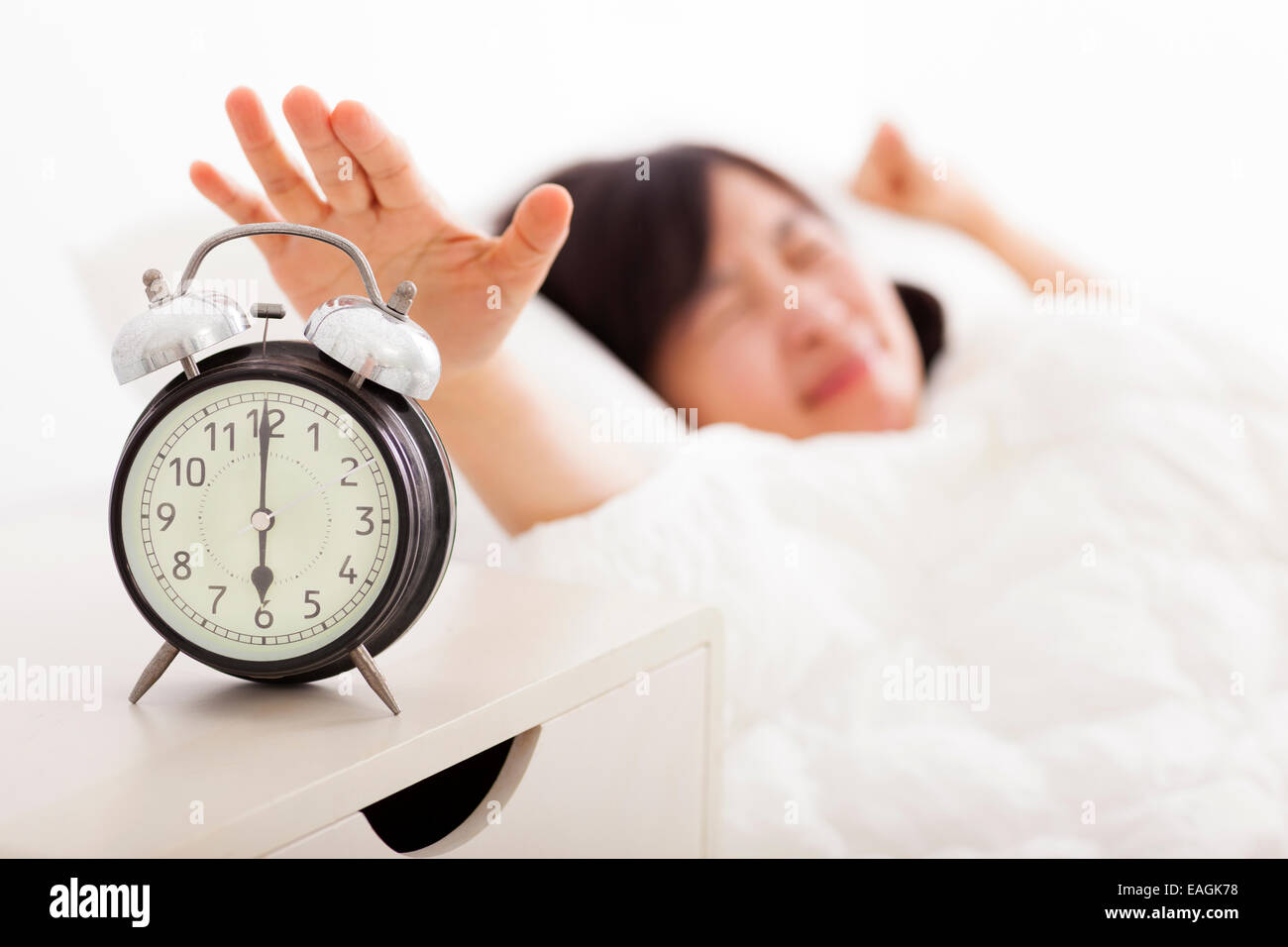 Woman clock bed hi-res stock photography and images - Alamy