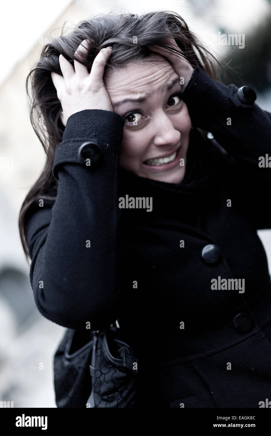 Stressed young woman Stock Photo - Alamy