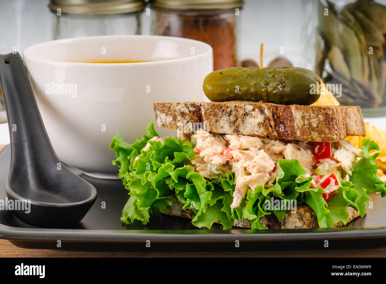 Tuna salad sandwich with lettuce on rye toast with butternut squash ...