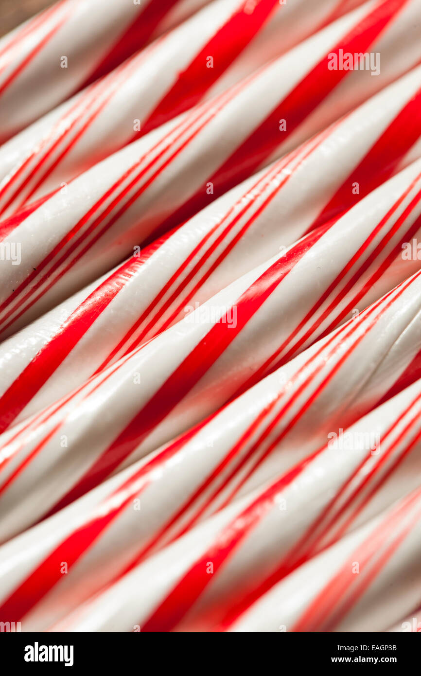Festive Red and White Peppermint Candy Canes Stock Photo - Alamy