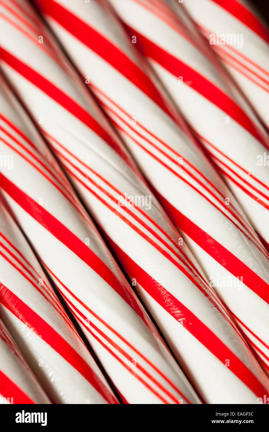 Festive Red and White Peppermint Candy Canes Stock Photo - Alamy