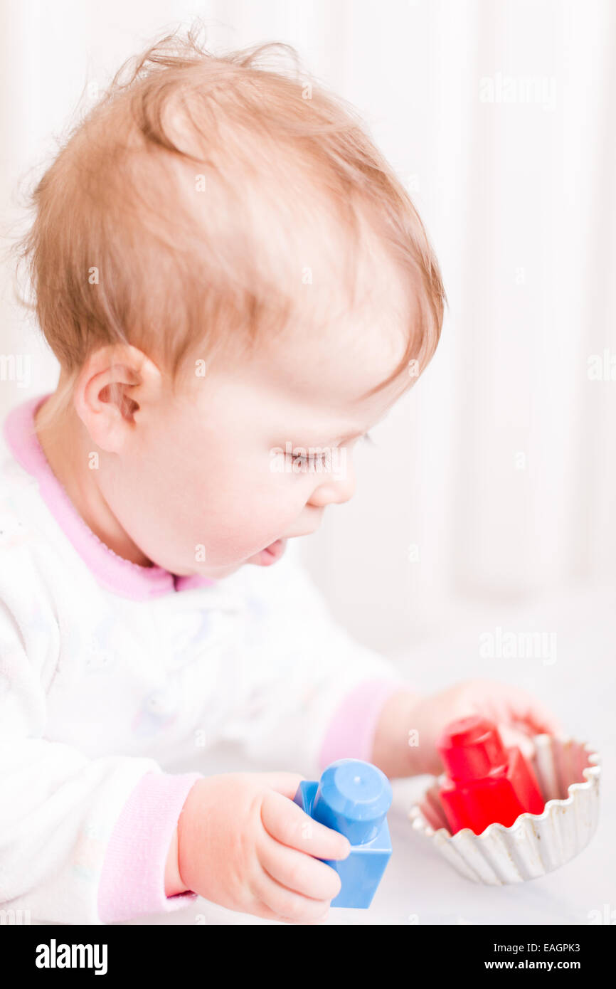 Cute baby girl playing cubes hi-res stock photography and images - Alamy