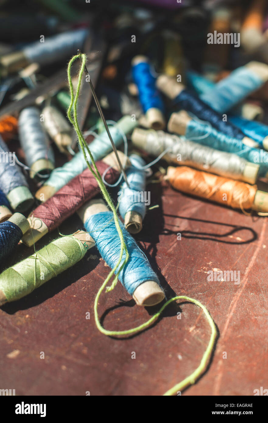 Vintage sewing thread and scissors Stock Photo - Alamy