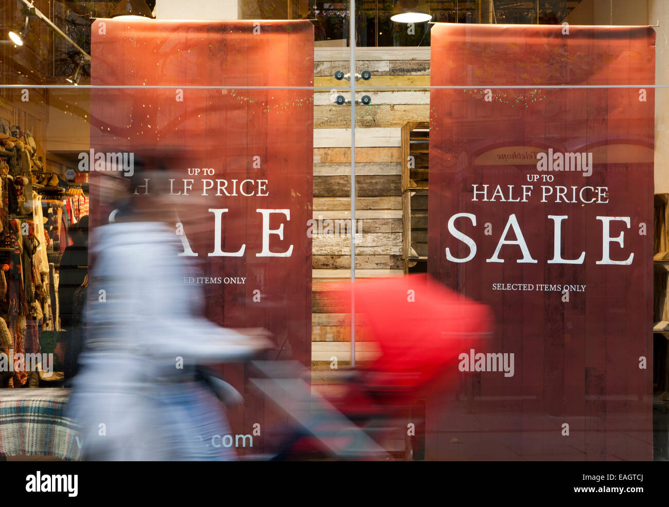 Sale sign Shoppers enjoying the various discounts & sale offers in ...