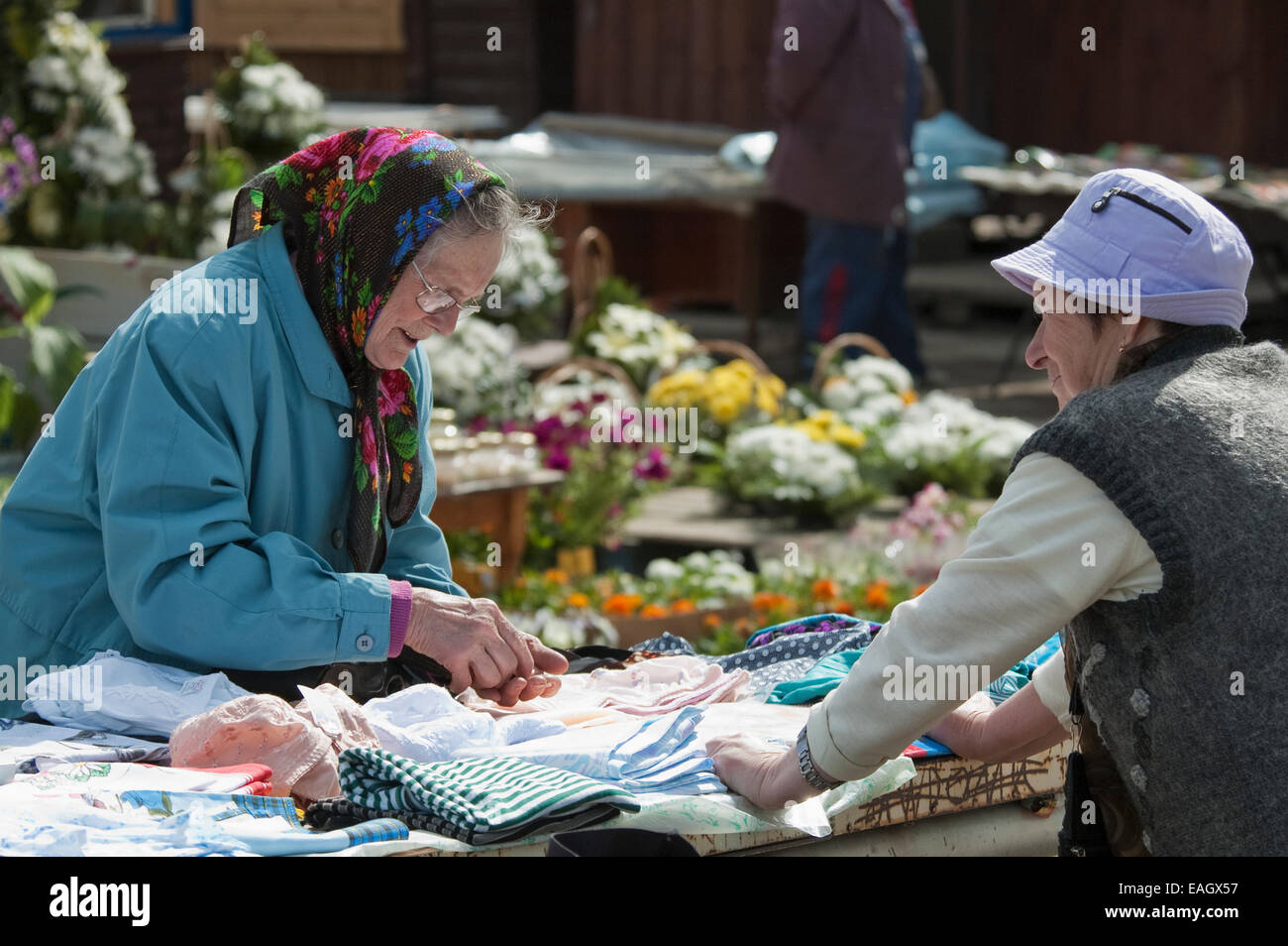 Woman selling clothes hi-res stock photography and images - Alamy