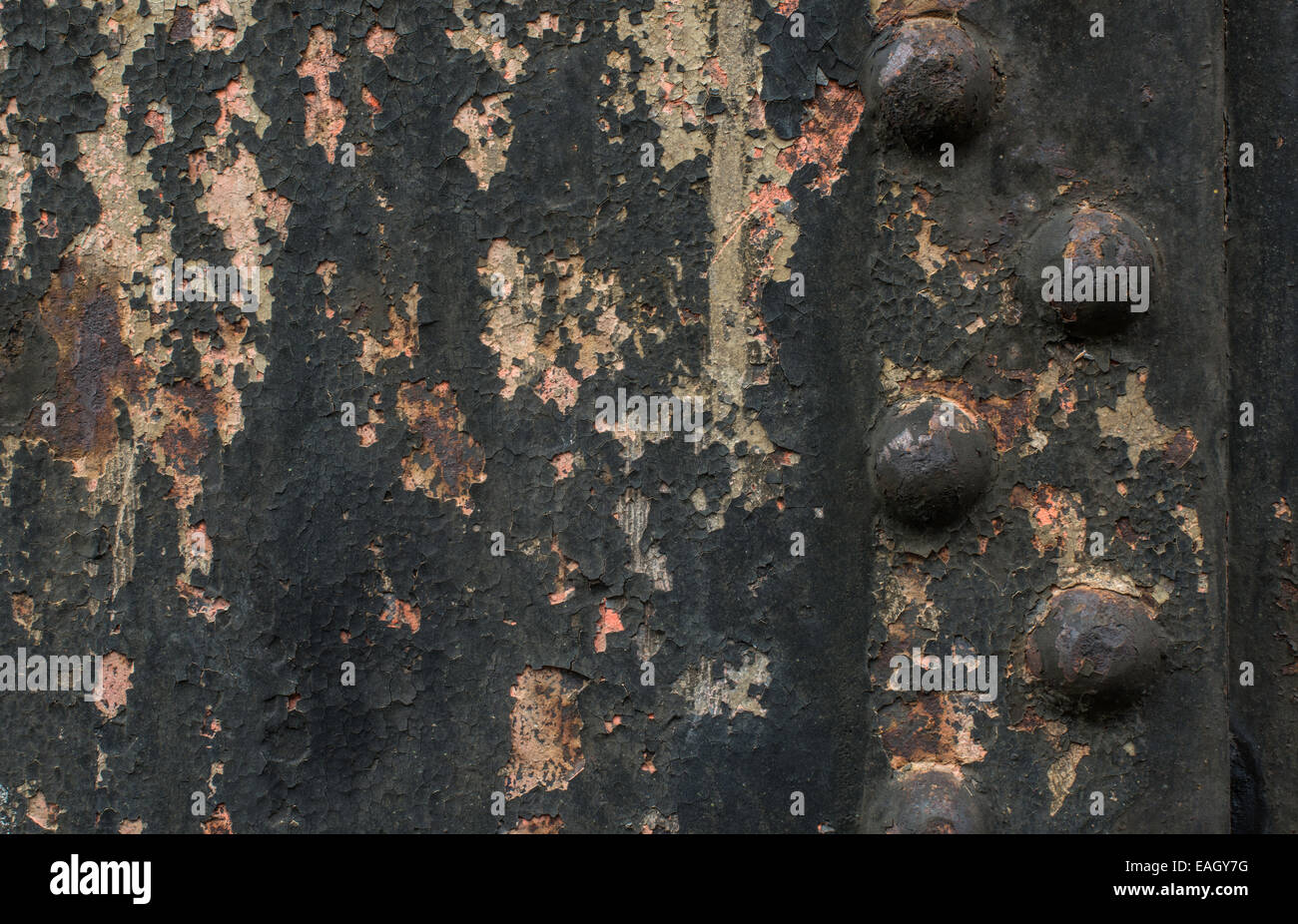 Black metal wall with rivets Stock Photo - Alamy