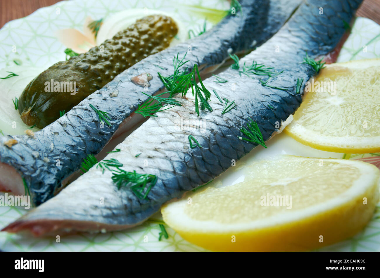 Traditional Dutch sandwich with marinated herring and cucumbers Stock ...
