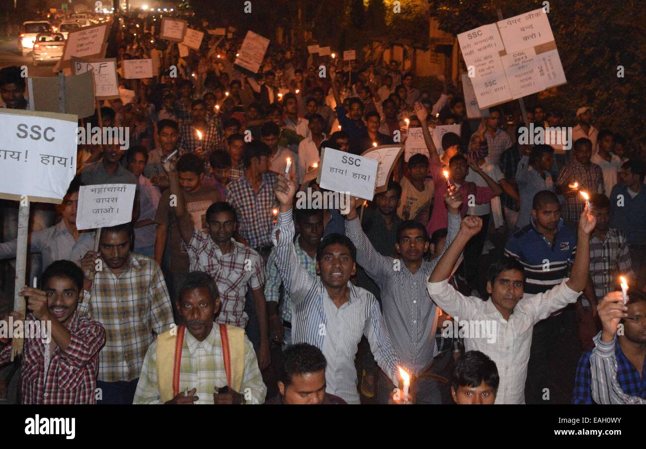 Students hold a candle march protest demanding the cancellation of ...