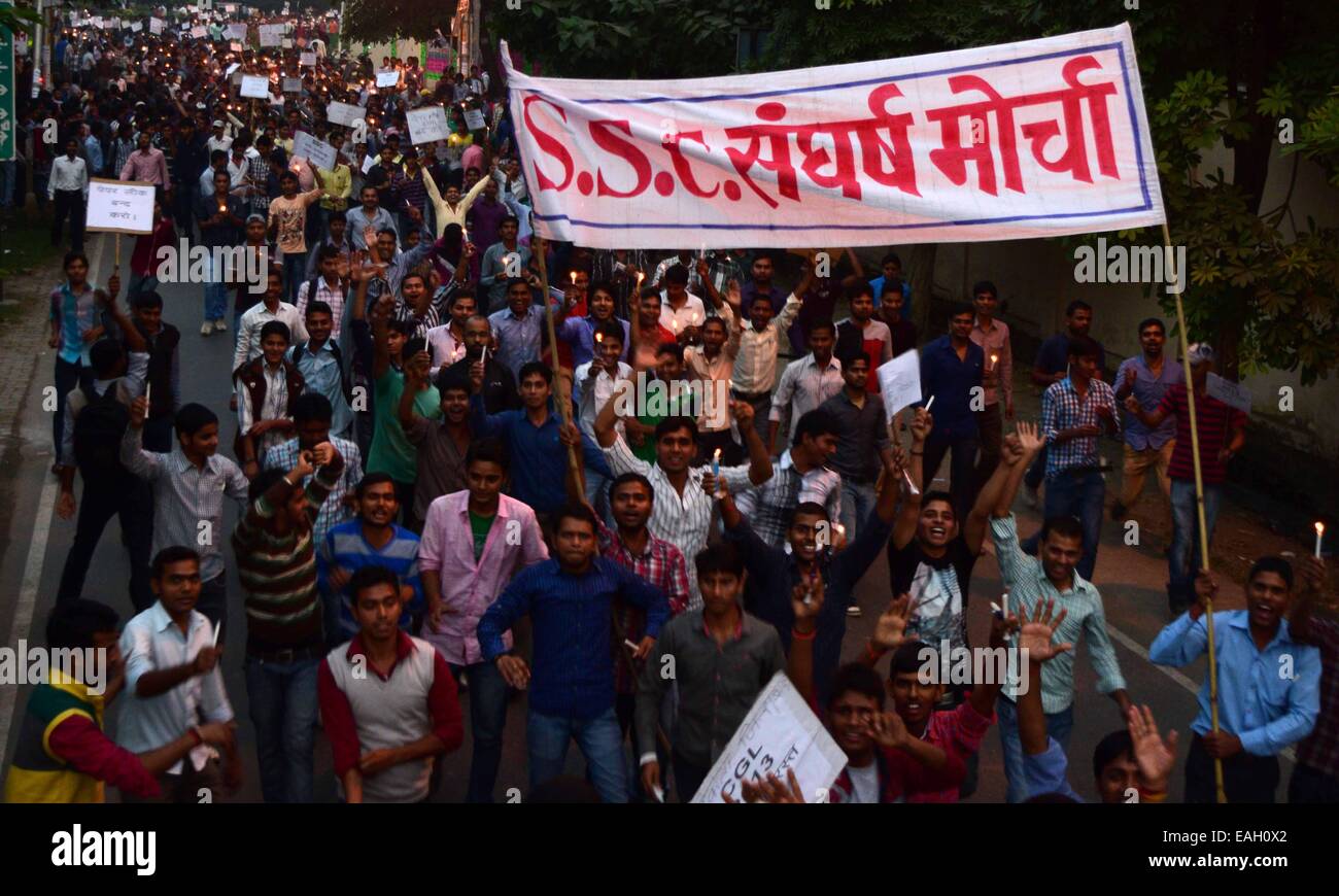 Students hold a candle march protest demanding the cancellation of ...