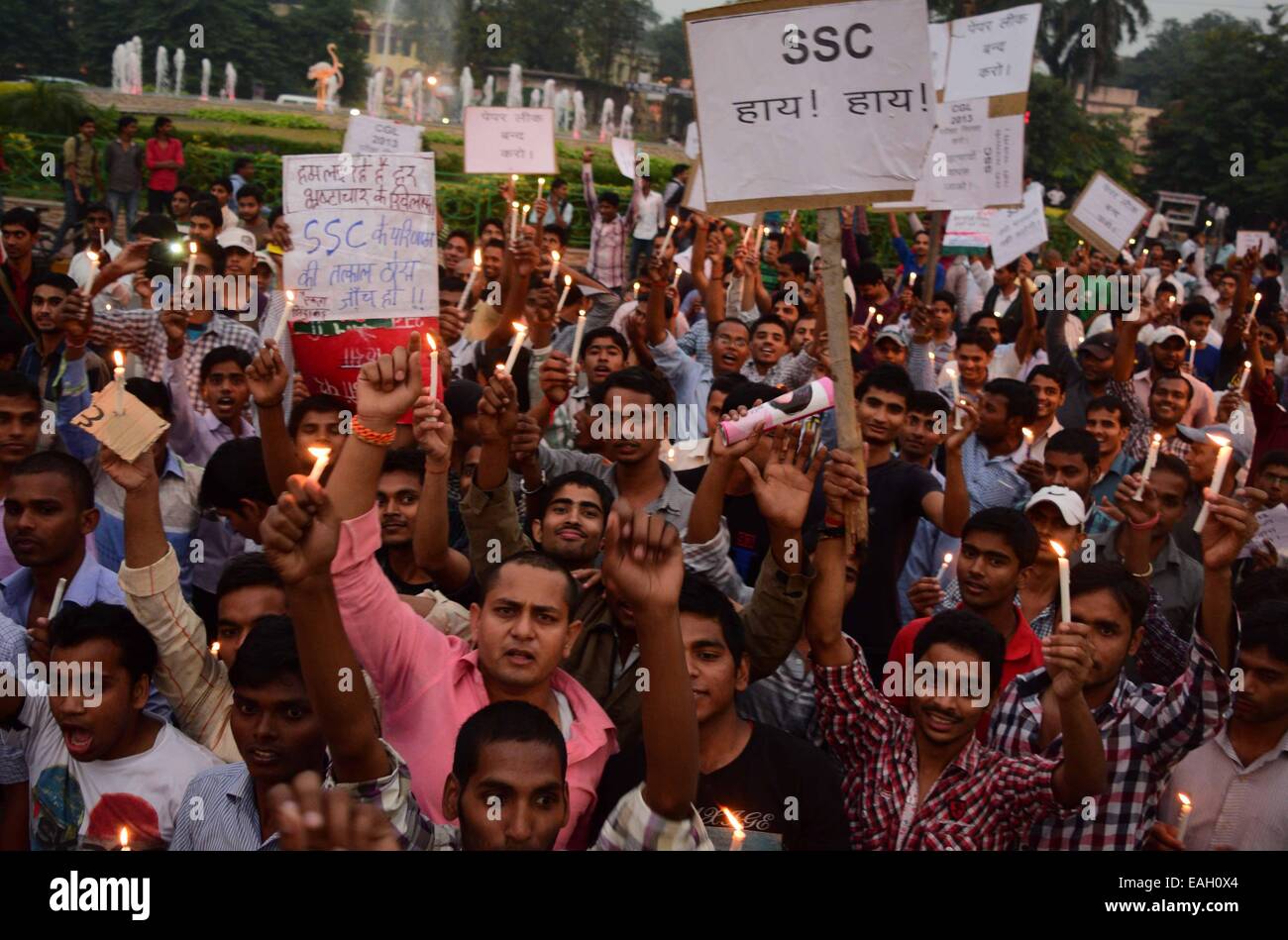 Students hold a candle march protest demanding the cancellation of ...