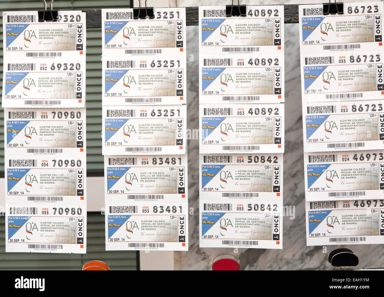 Close up of lottery tickets on sale at a street stall in Seville, Spain ...