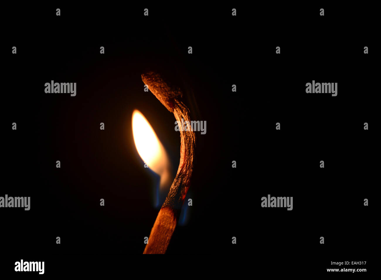match fire isolated on black background Stock Photo - Alamy