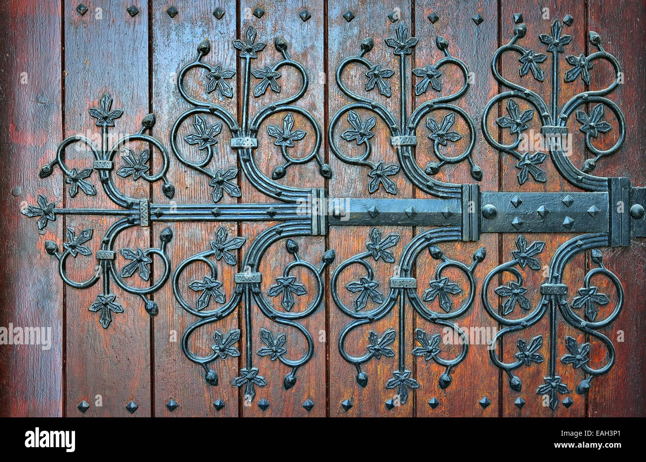 Medieval style wooden gates of basilica Saint-Materne or Notre-Dame de ...