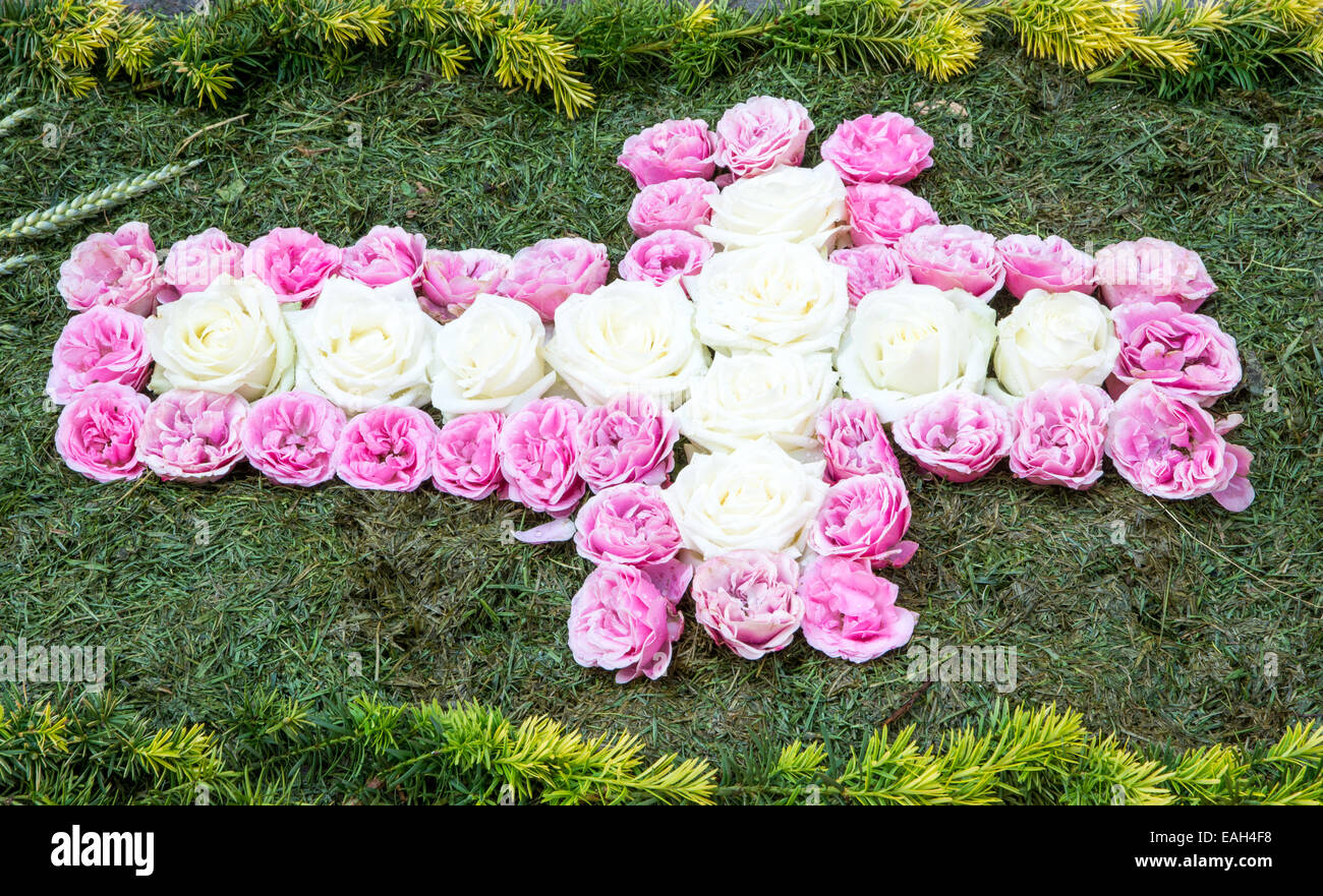 Cross made of rose flowers - decoration for Corpus Christi Celebration ...