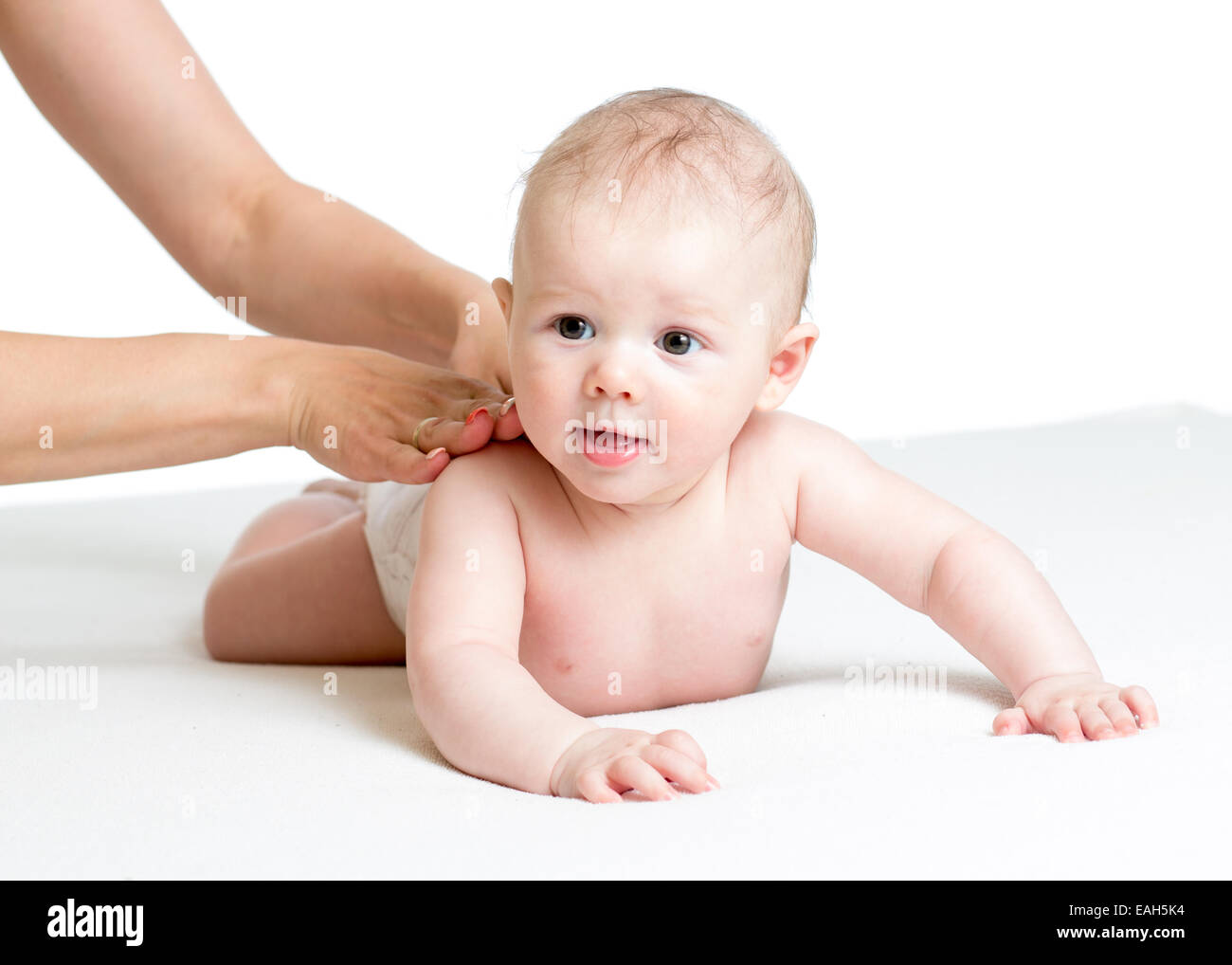mother give baby back massage Stock Photo - Alamy
