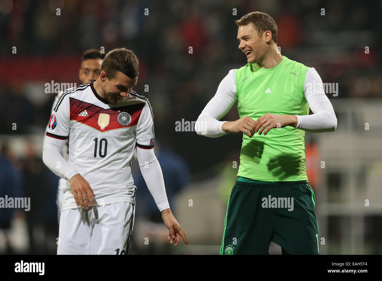 Nuremberg, Germany. 14th Nov, 2014. Germany's Lukas Podolski (L) and ...