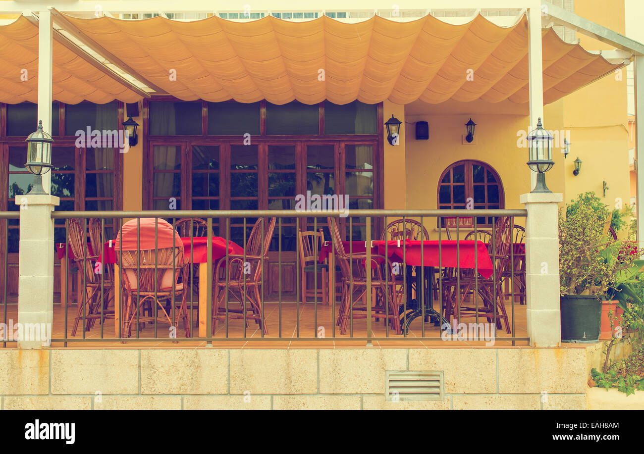 Mediterranean cafe terrace exterior with chairs Stock Photo - Alamy
