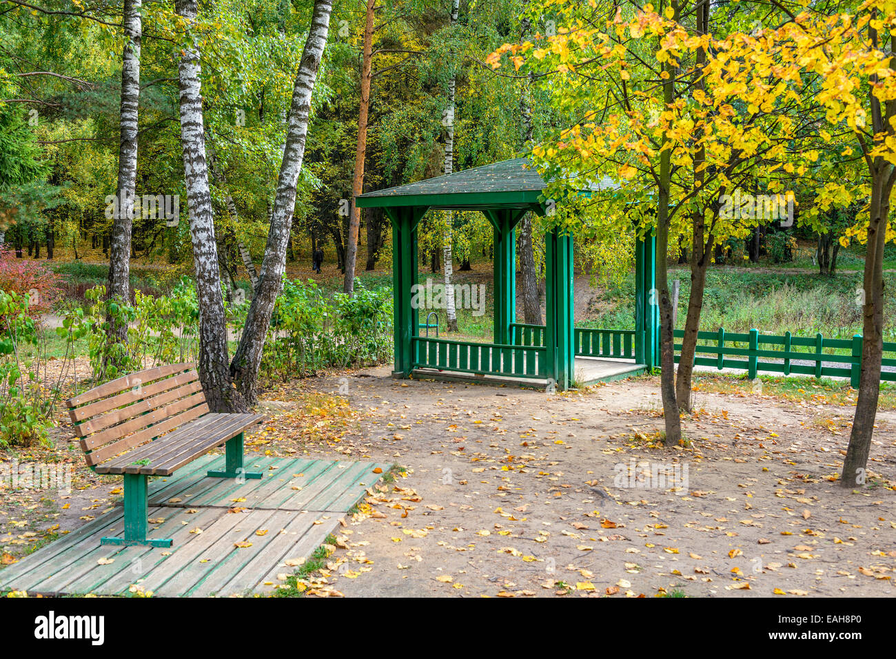 Landscape with bench and pavilion in autumn park Stock Photo - Alamy