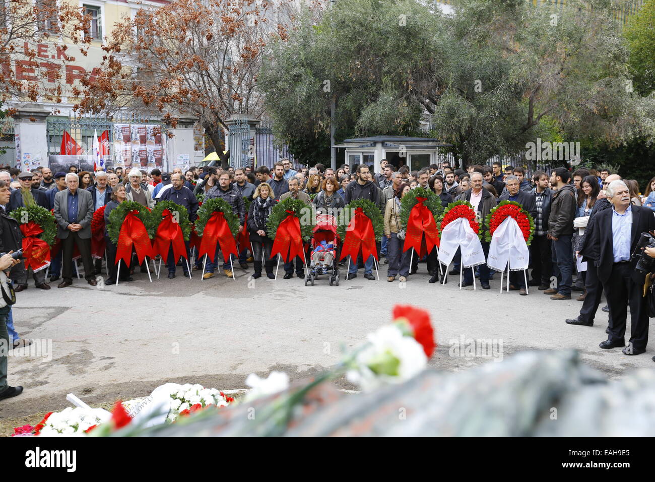 Athens, Greece. 15th November 2014. Construction workers stand with red ...