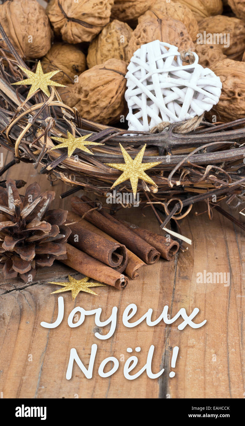 french Christmas card with nuts, cones and cinnamon Stock Photo - Alamy