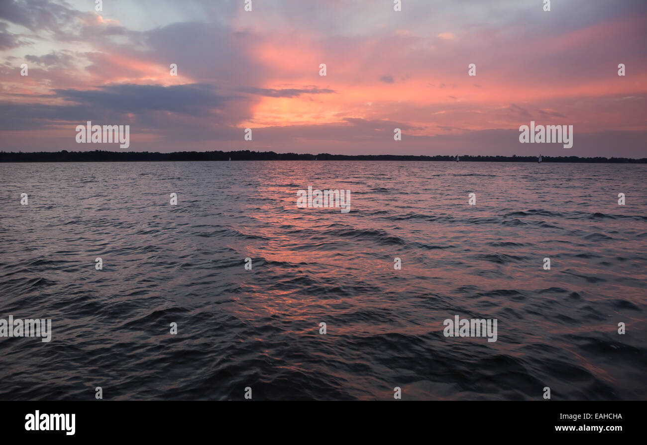 Sunset with beautiful sky over lake Stock Photo - Alamy