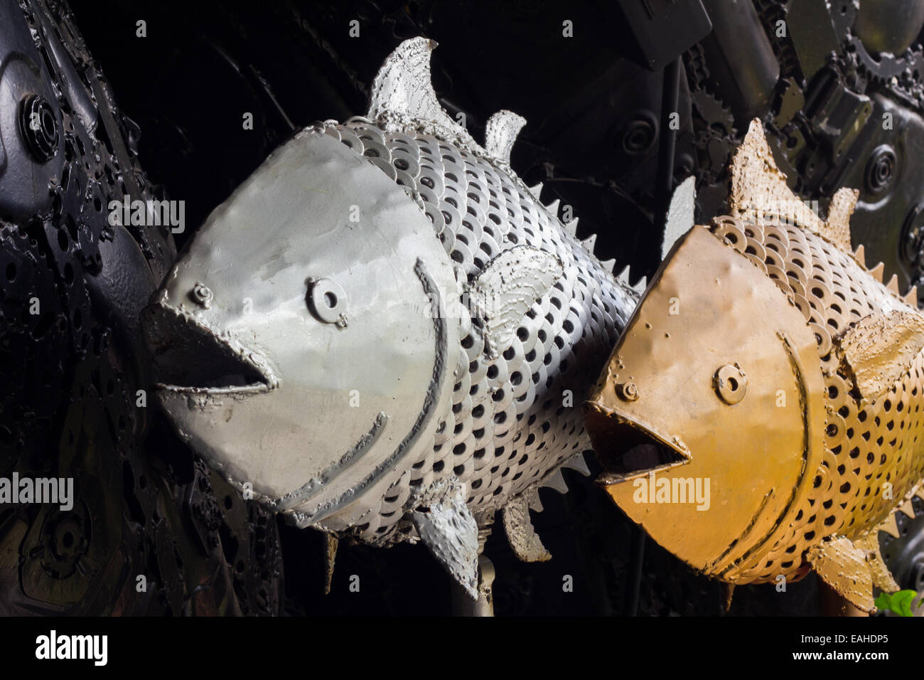 bronze and gold fish statue in public park Stock Photo - Alamy