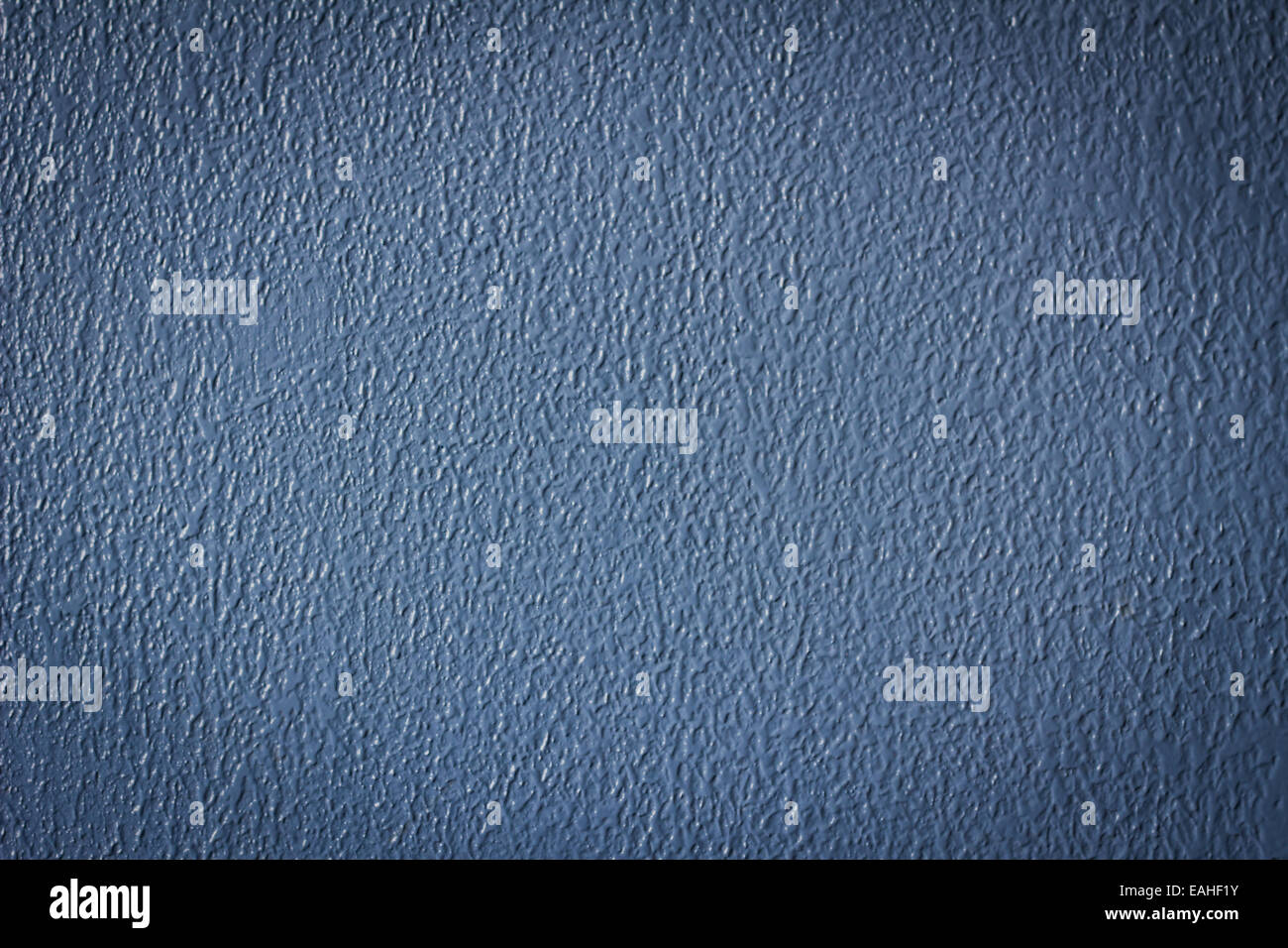 Modern blue wall texture, with vignette Stock Photo - Alamy