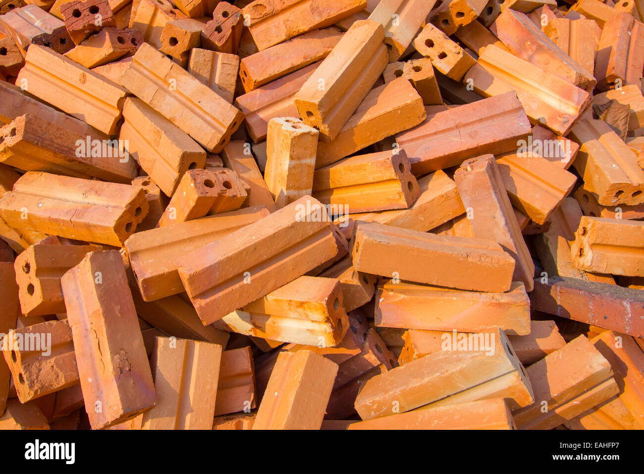 Pile of red bricks Stock Photo - Alamy