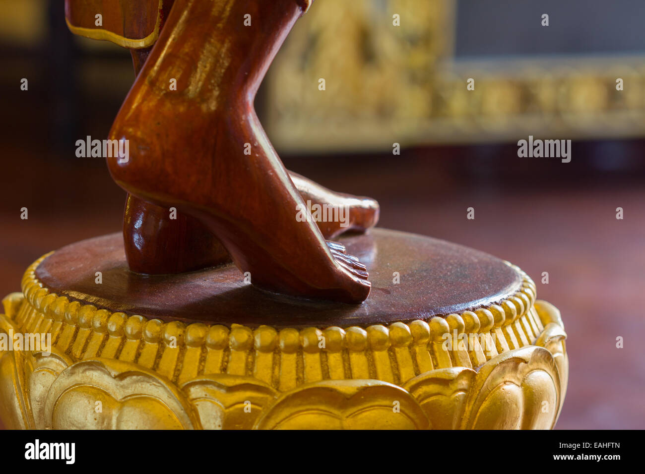 feet of wooden buddha Stock Photo - Alamy
