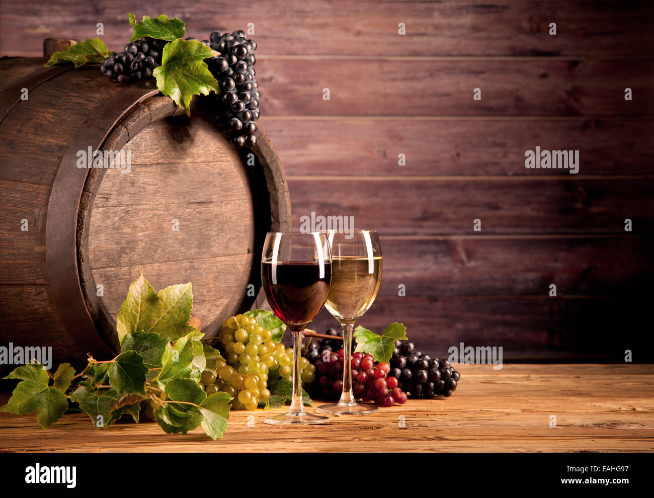 Still life of wine with wooden keg Stock Photo - Alamy