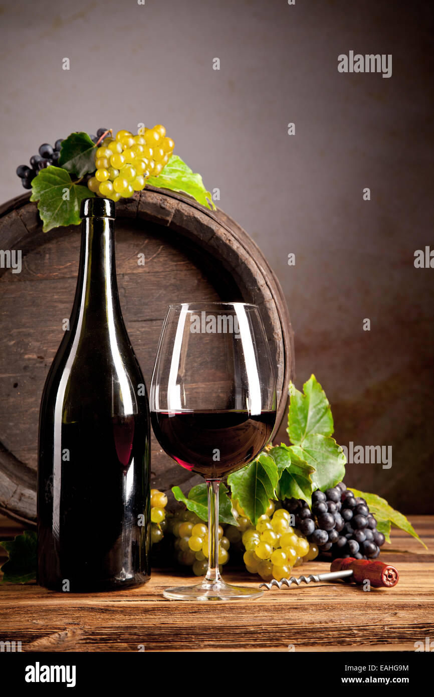 Still life of wine with wooden keg Stock Photo - Alamy