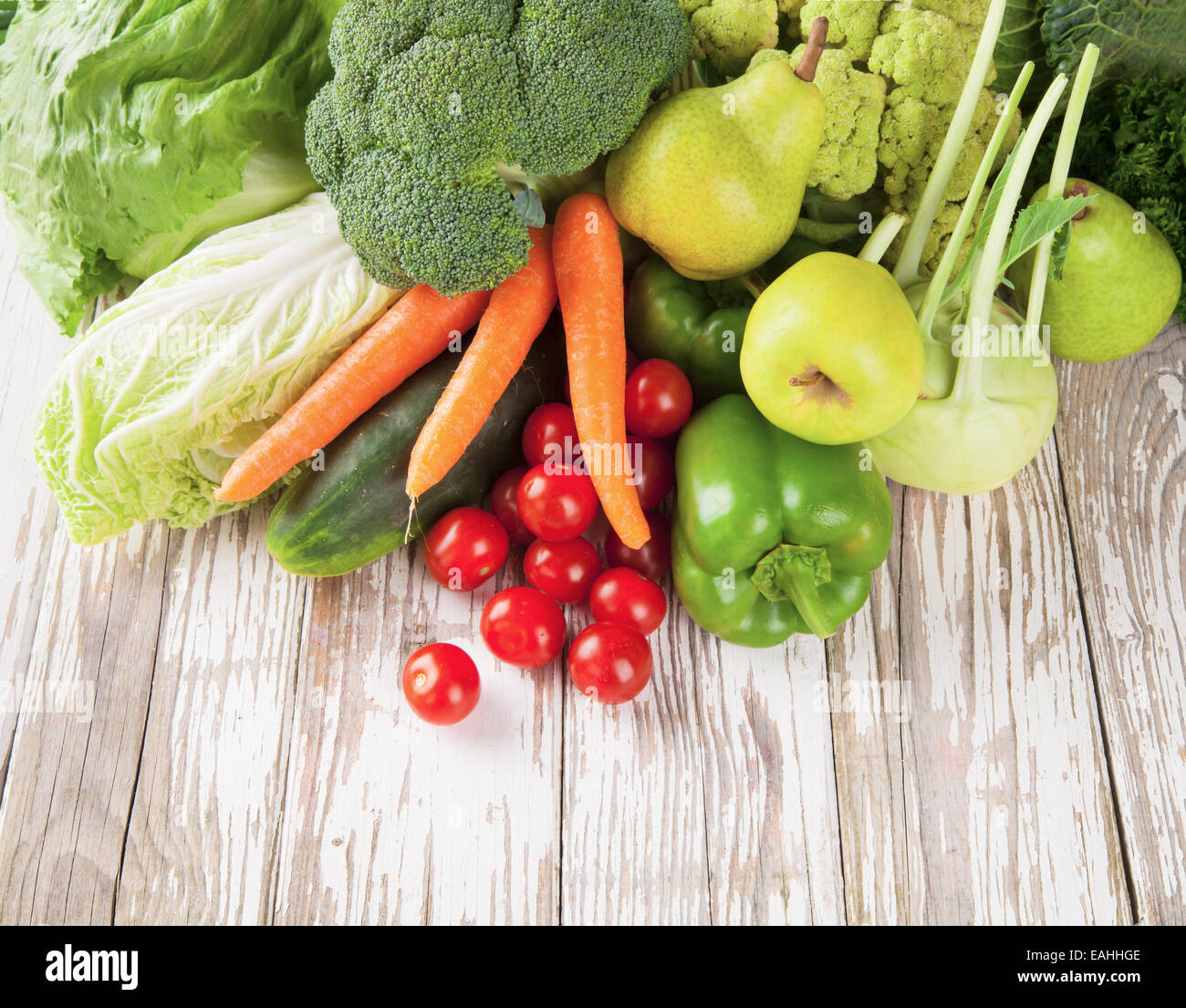 Various kinds of vegetable on wooden desk Stock Photo - Alamy