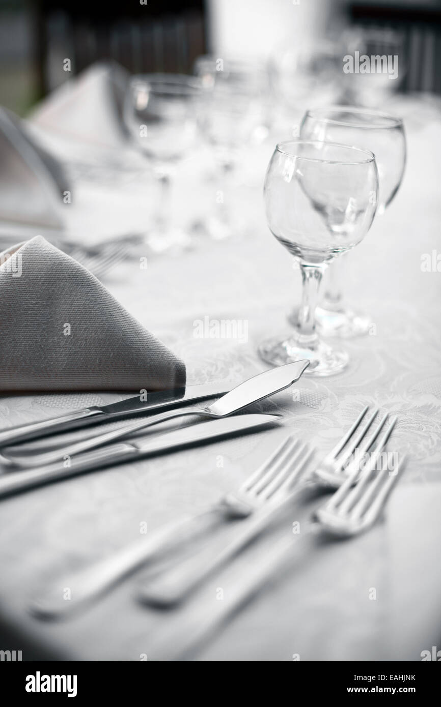 Shot with a dinner table in a restaurant Stock Photo - Alamy