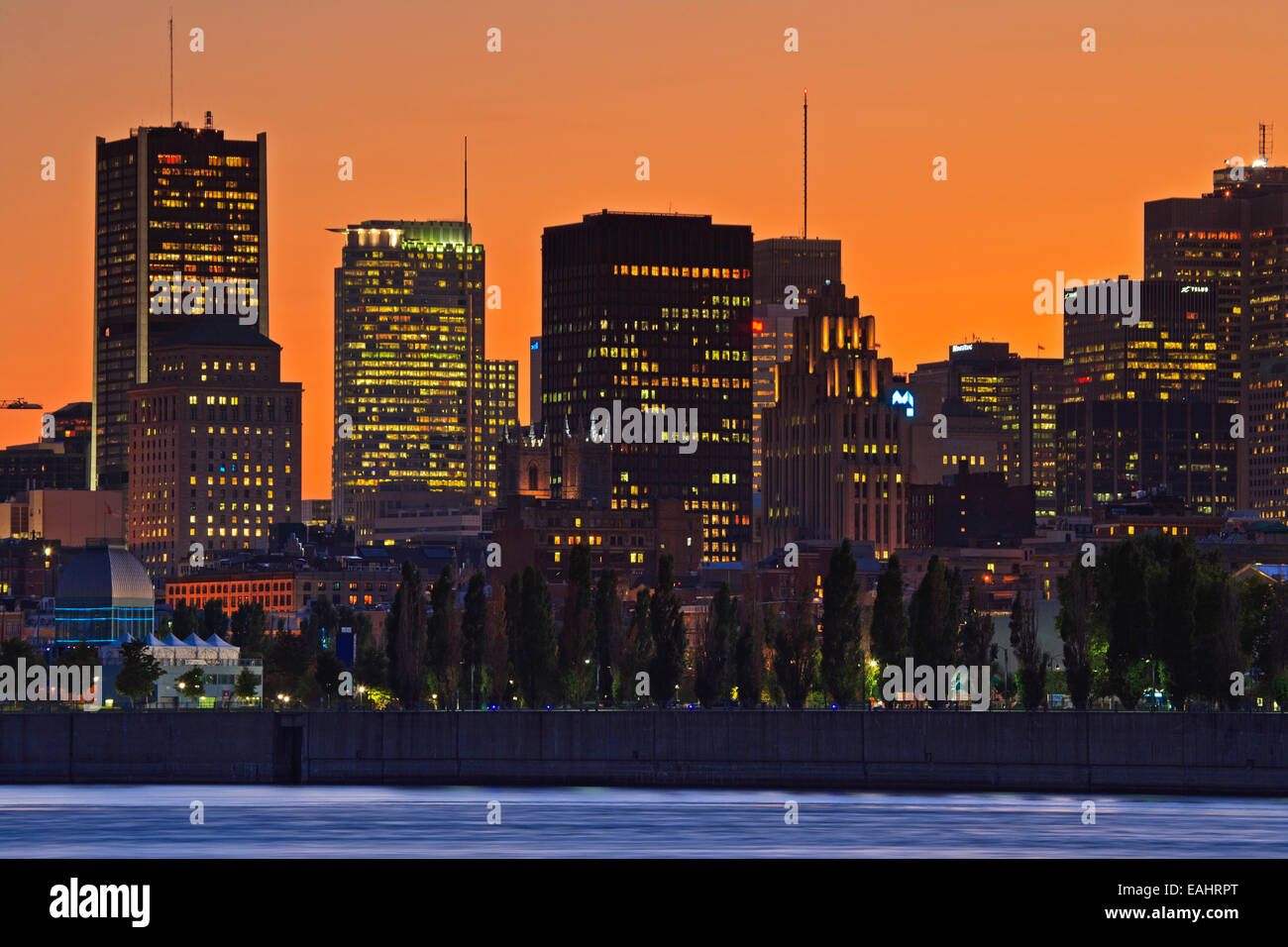 City of Montreal Skyline at sunset seen from across the St Lawrence ...