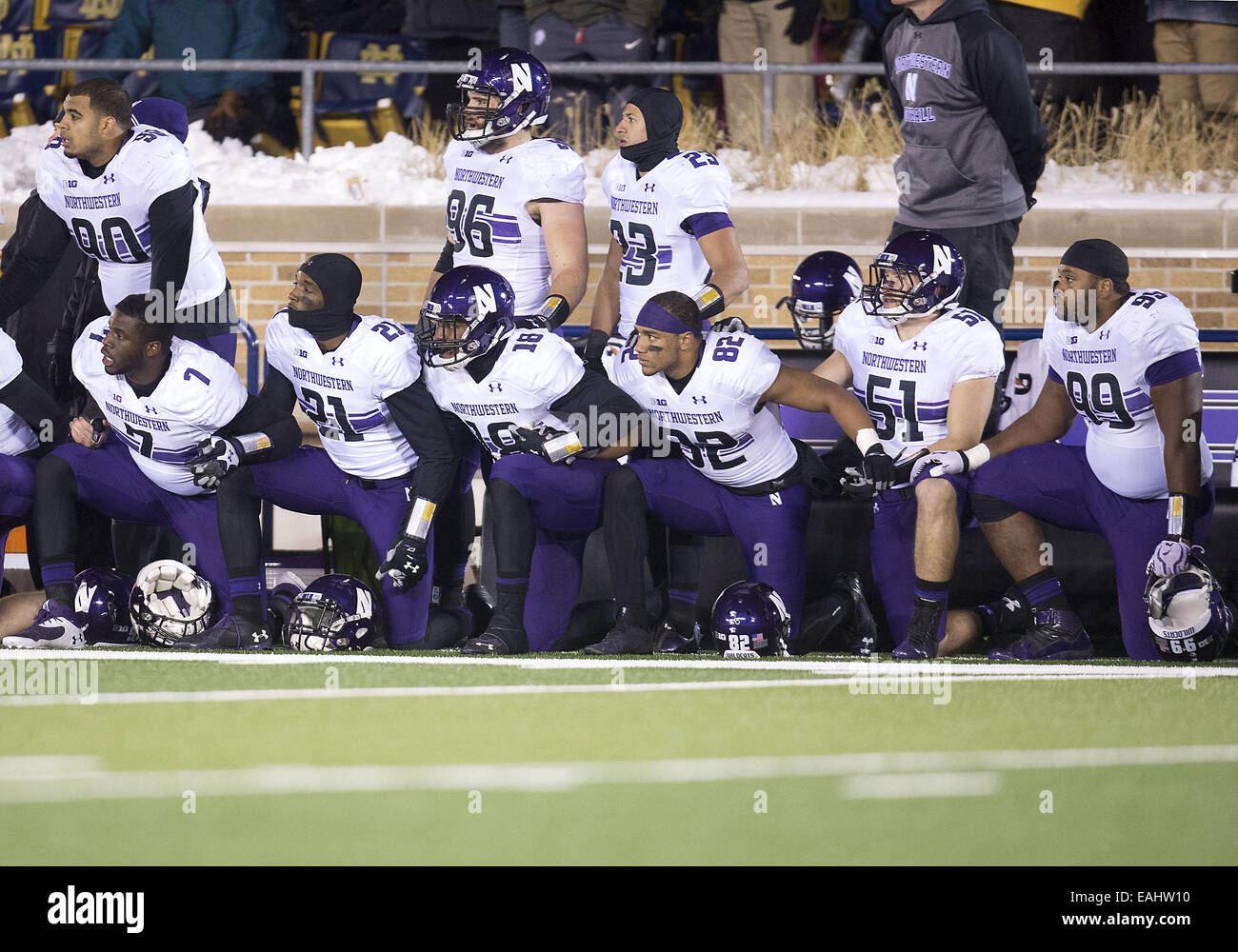 Overtime. 15th Nov, 2014. Northwestern players lock arms before game ...