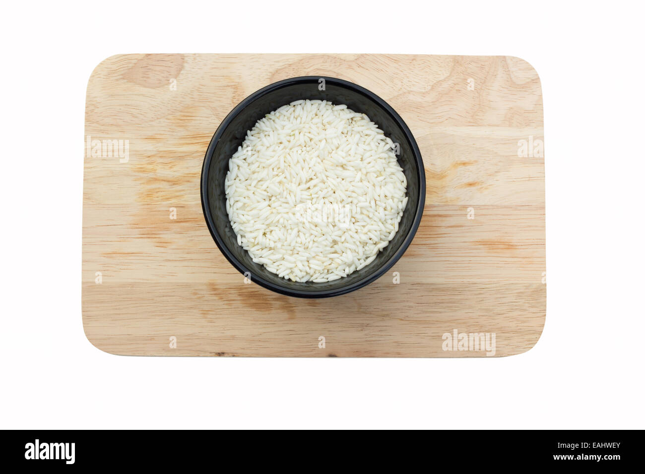 Uncooked rice in a bowl hi-res stock photography and images - Alamy