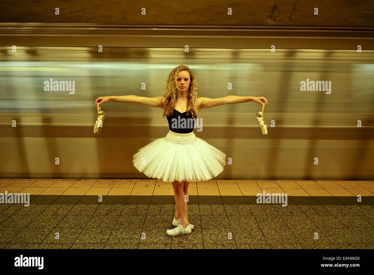 Classic ballerina with tutu dancing in the New York Subway Stock Photo ...