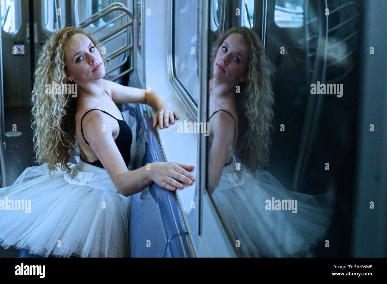 Classic ballerina with tutu dancing in the New York Subway. Classic ...