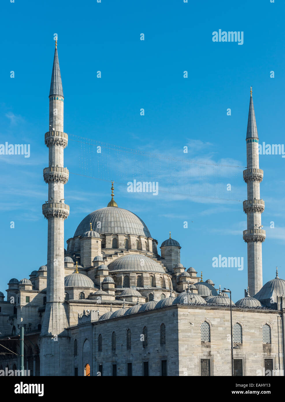 The minarets and central dome of the New Mosque (Yeni Cami) in Istanbul ...