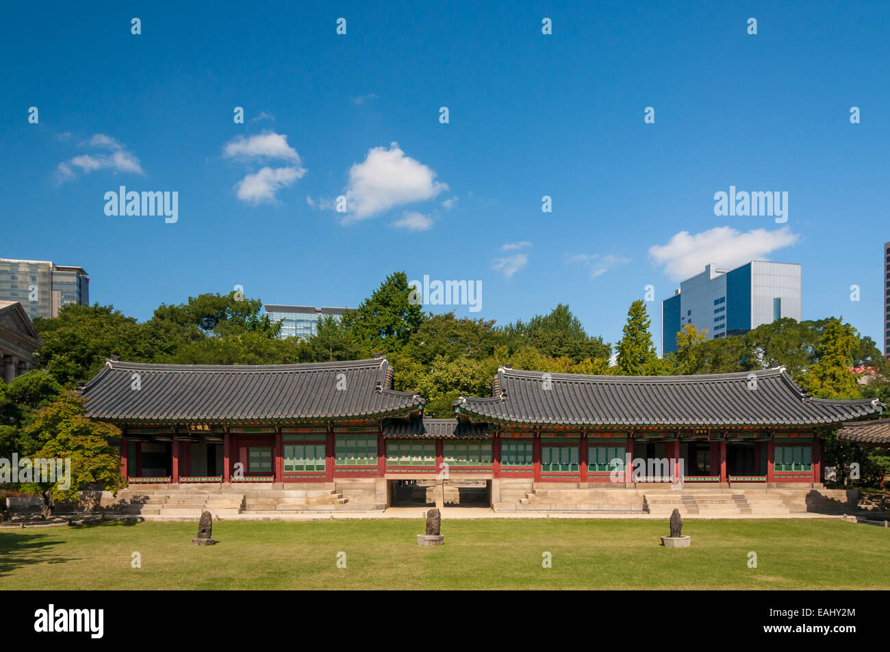 The traditional Korean architecture of Deoksung Palace against the ...