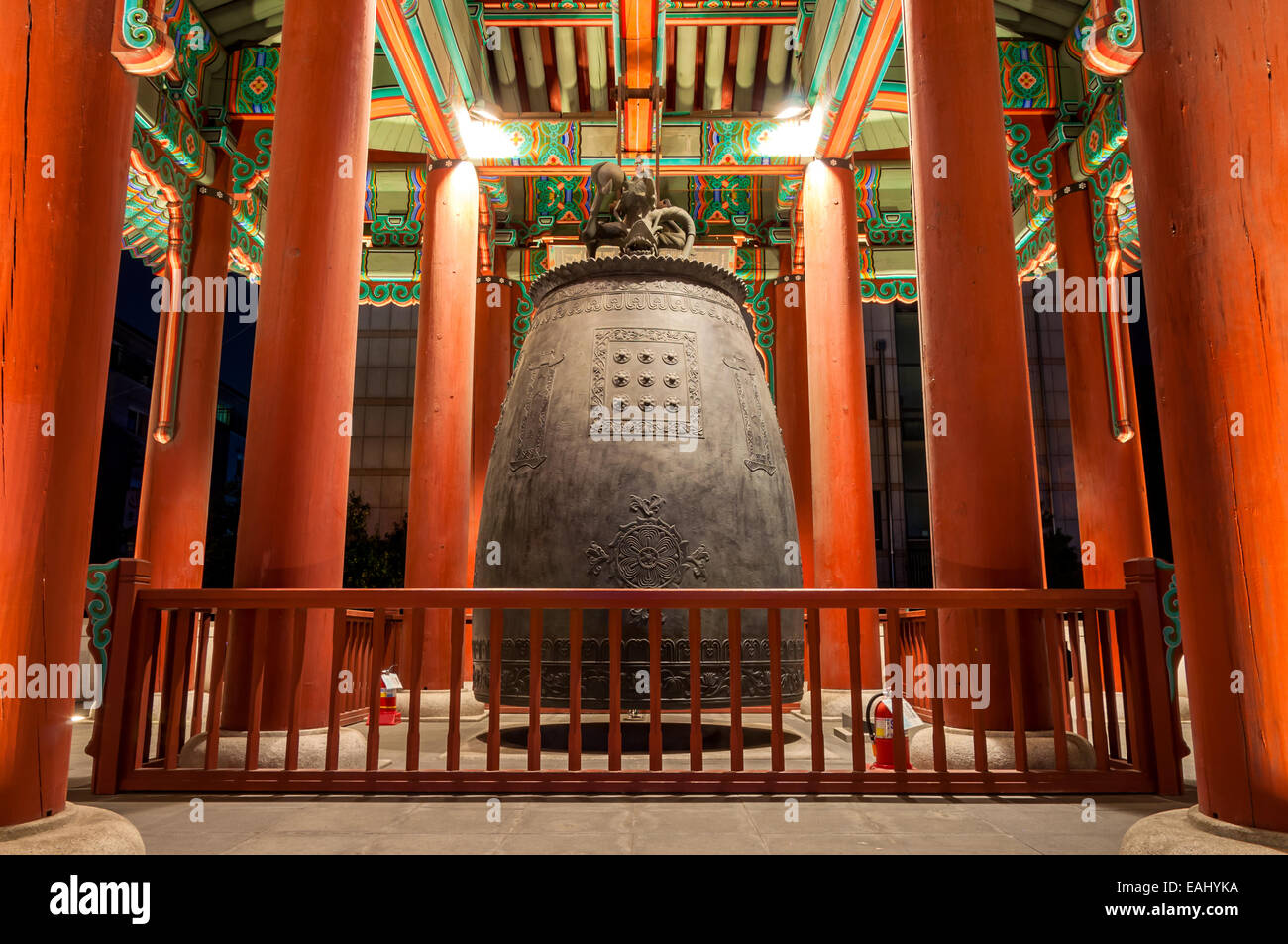 A giant bell hangs within a pavilion at Hwaseong Fortress in Suwon, a ...