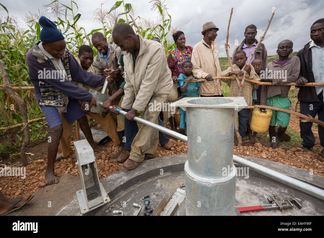 Community members in Sukuroi village, Bukwo District, Uganda work to ...