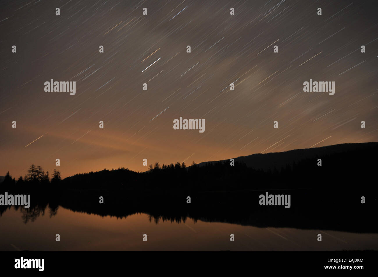 Summer sunset over a lake Stock Photo - Alamy