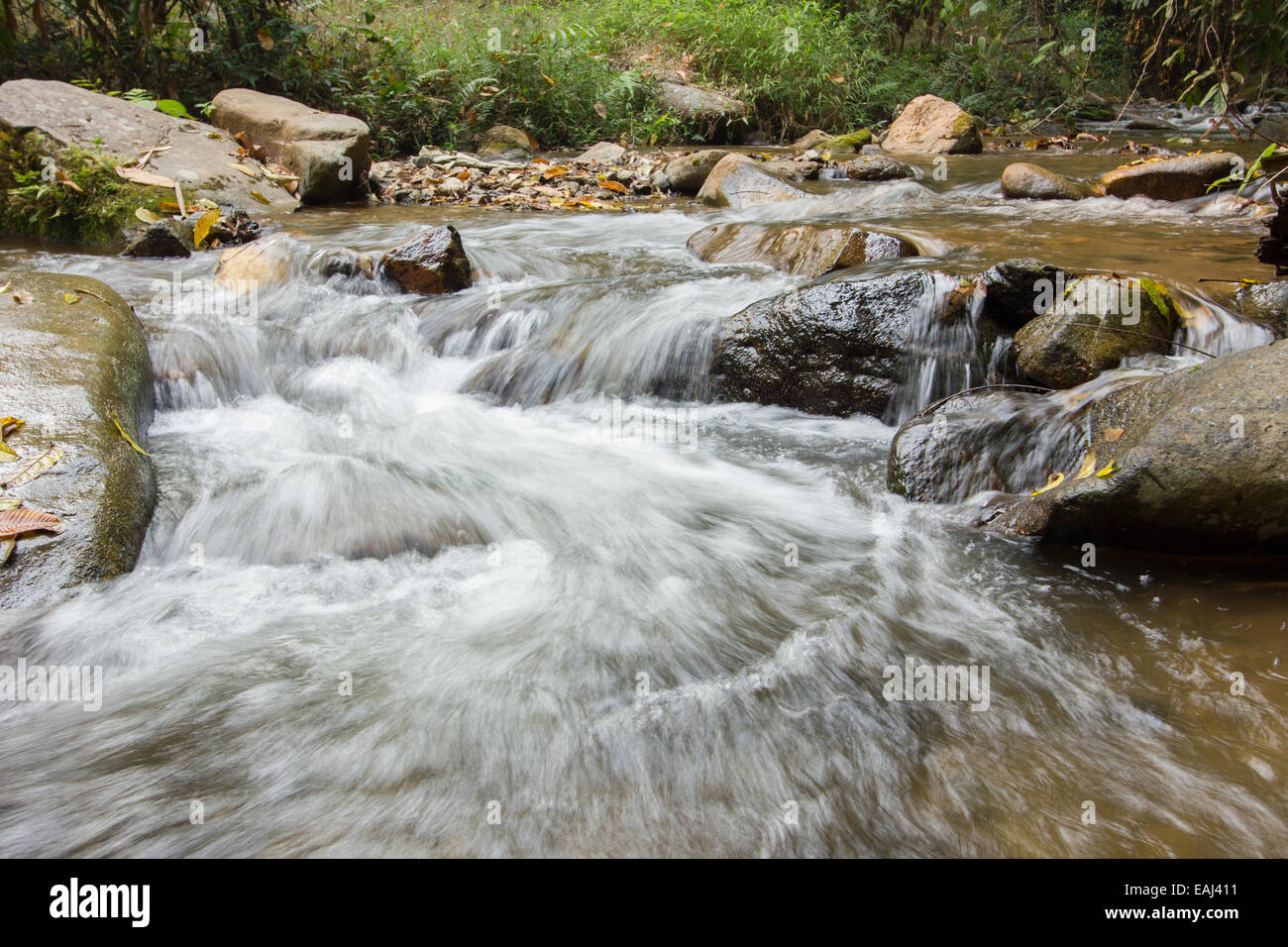 Nice small waterfall on mountain brook Stock Photo - Alamy