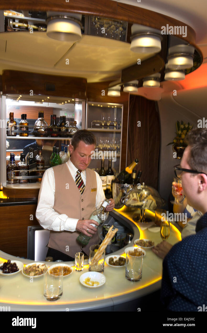 Emirates Airline, passenger in bar of A380 Business Class cabin Stock ...
