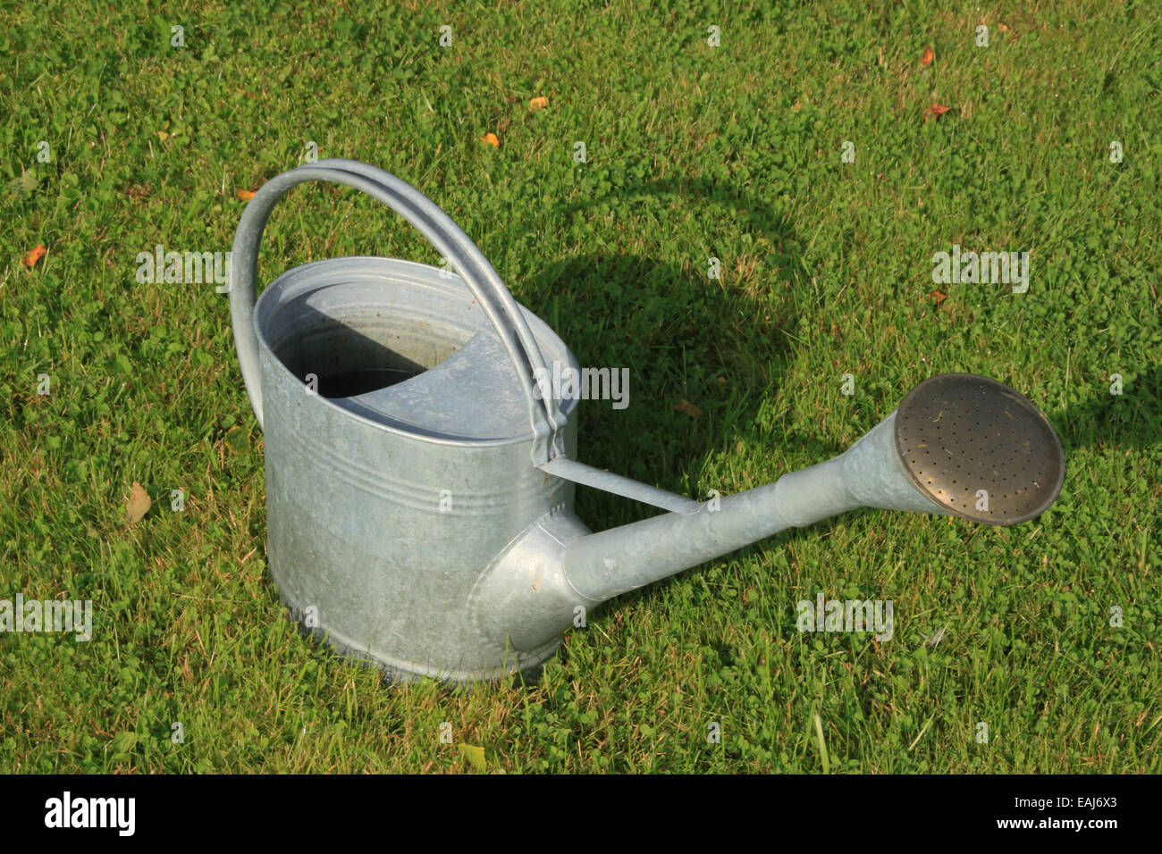 Old rusty watering can on hi-res stock photography and images - Alamy