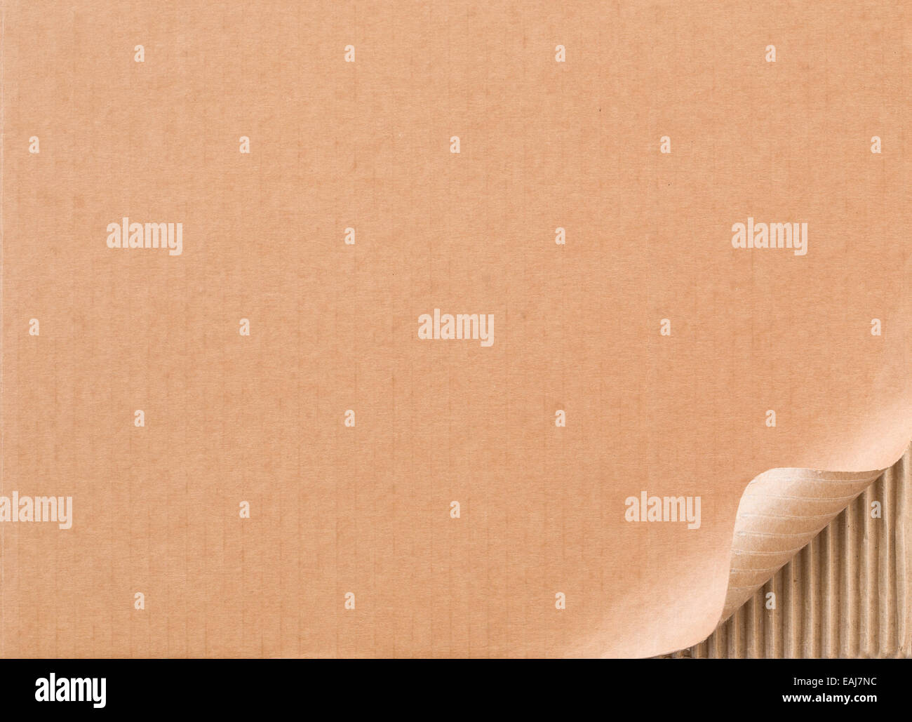 Corrugated cardboard with curled corner Stock Photo - Alamy
