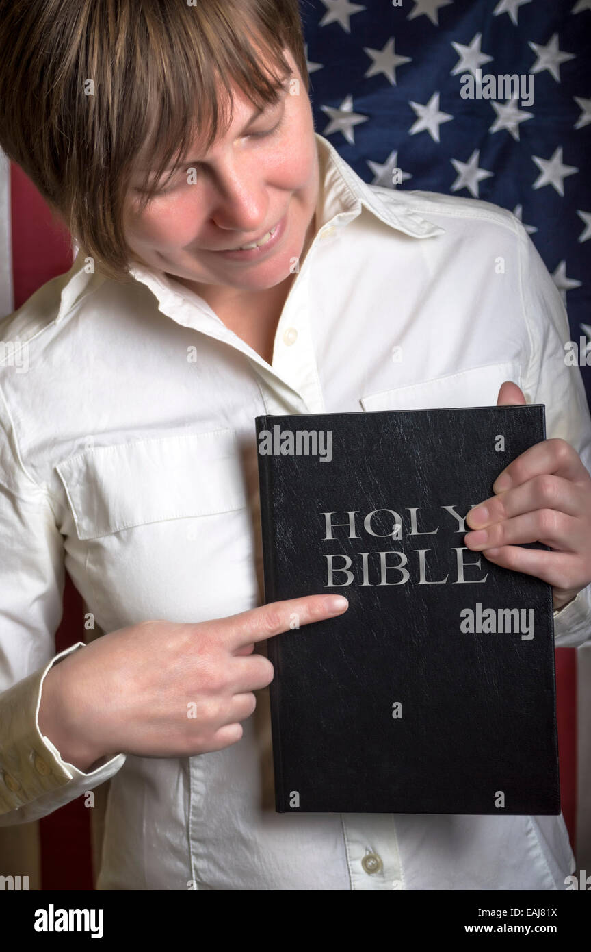 Girl holding bible hi-res stock photography and images - Alamy